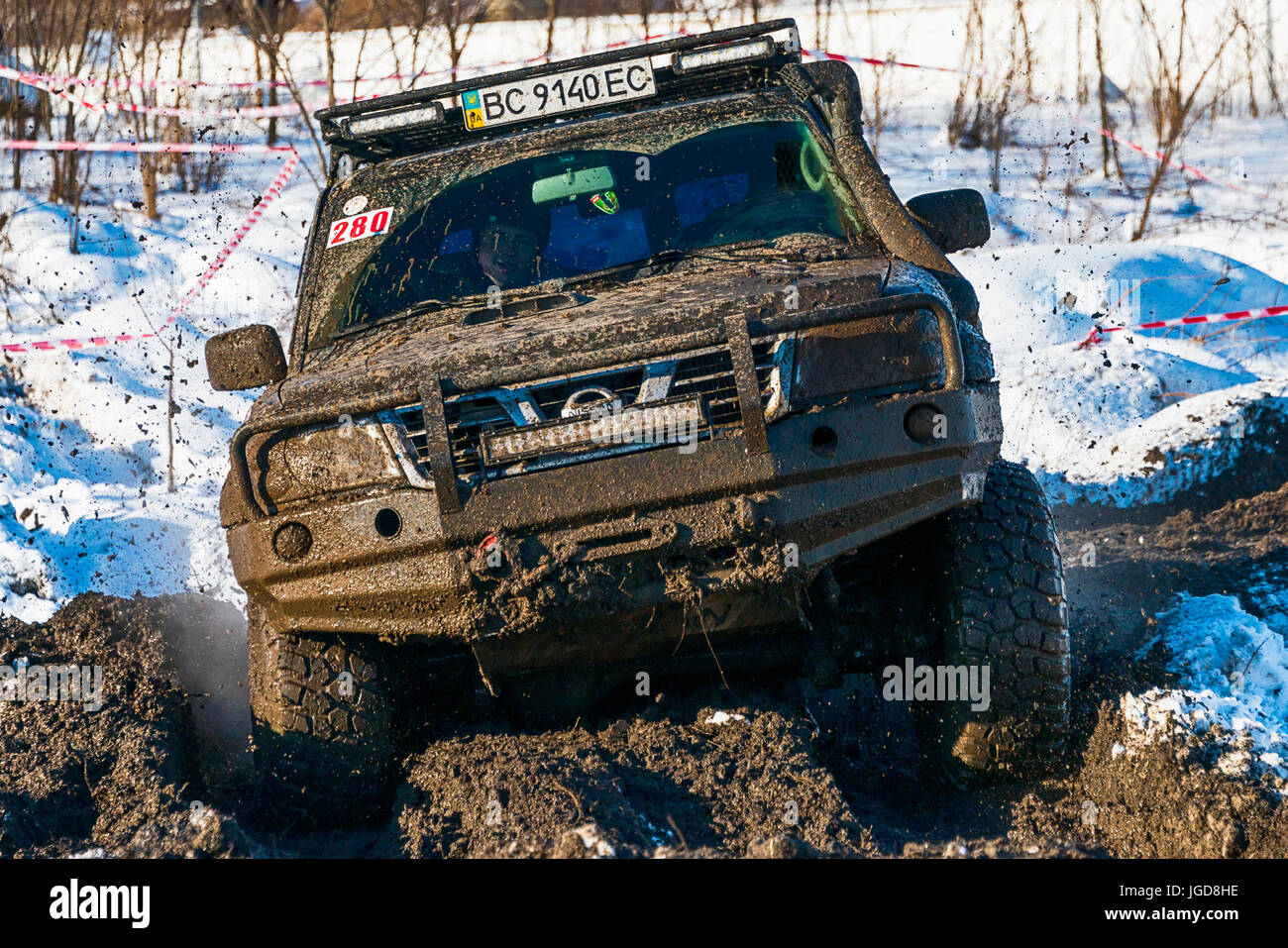 Lviv, Ukraine - December 04, 2016: Unknown racers on off-road vehicle ...