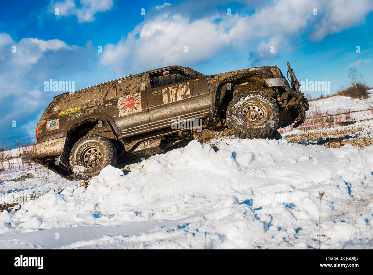 Lviv, Ukraine - December 04, 2016: Unknown racers on off-road vehicle ...