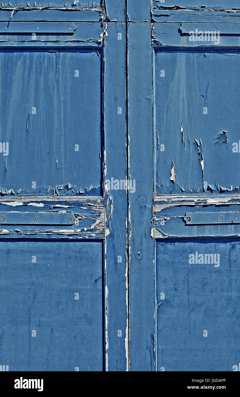 blue fading paint on wooden door Stock Photo - Alamy