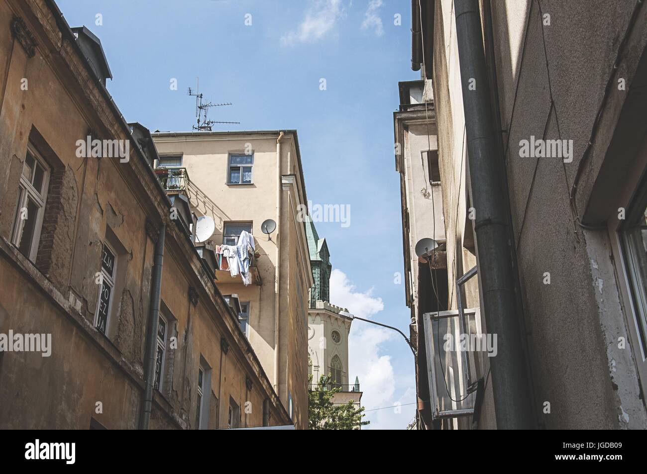laundry hanging in poor part of the city Stock Photo - Alamy