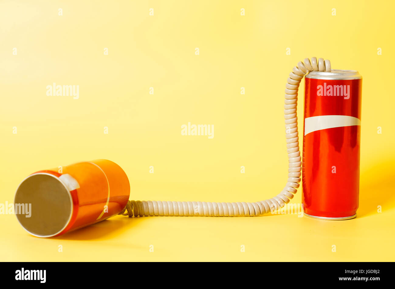 Tin can phone. communication concept Stock Photo - Alamy