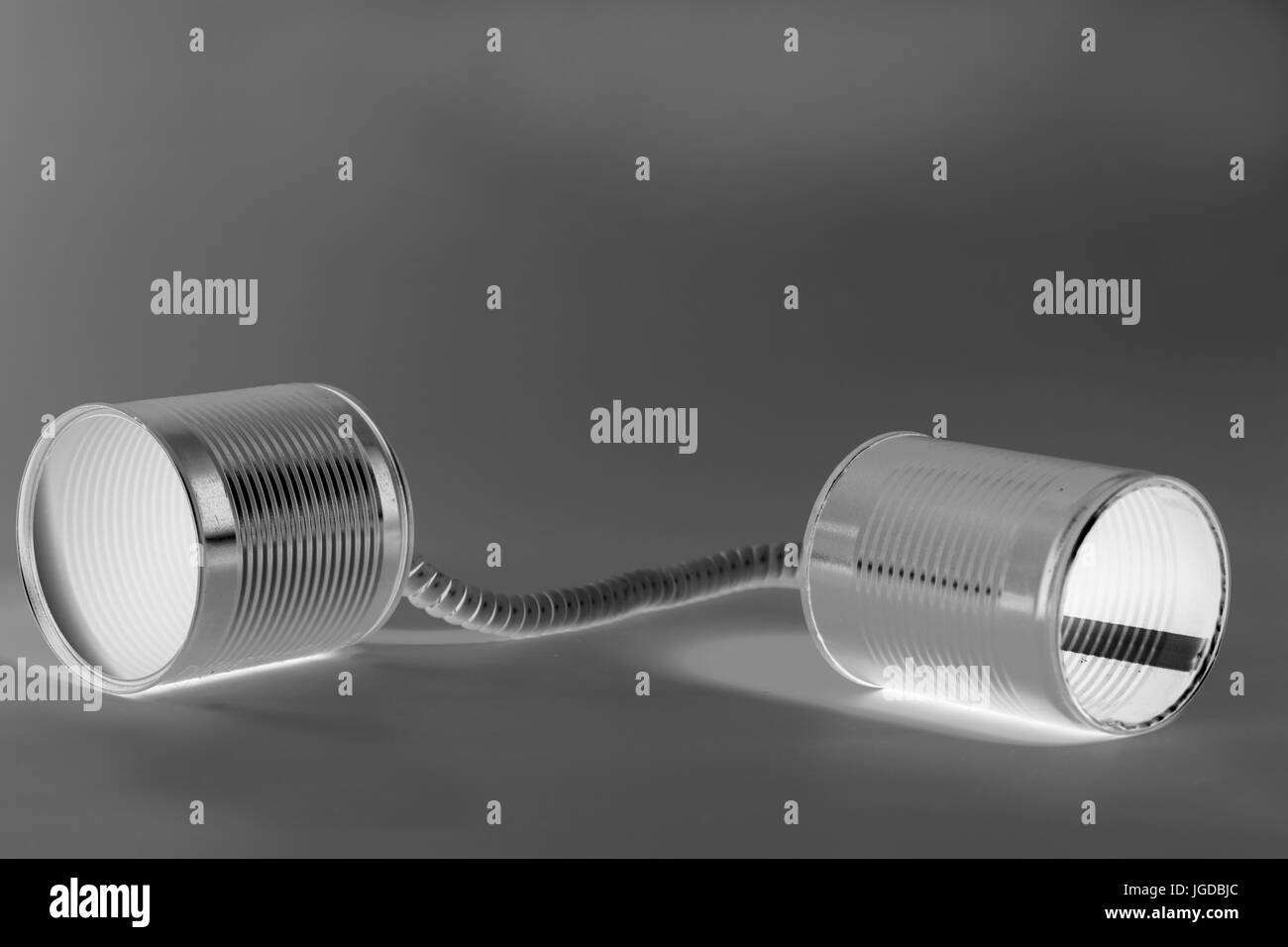 On a string and can phone hi-res stock photography and images - Alamy