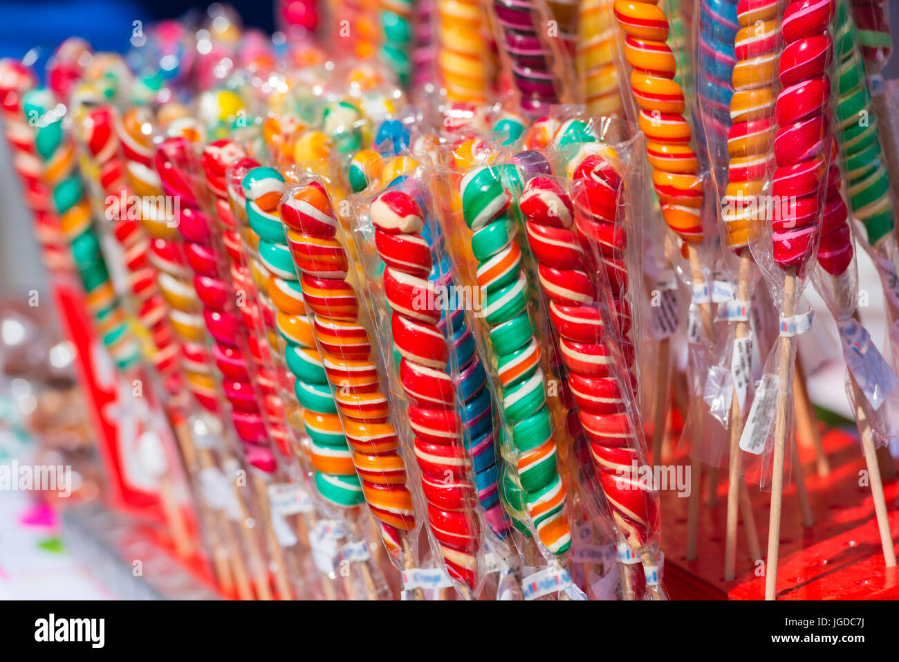 Close up of colorful handmade swirl lollipops on street market Stock ...