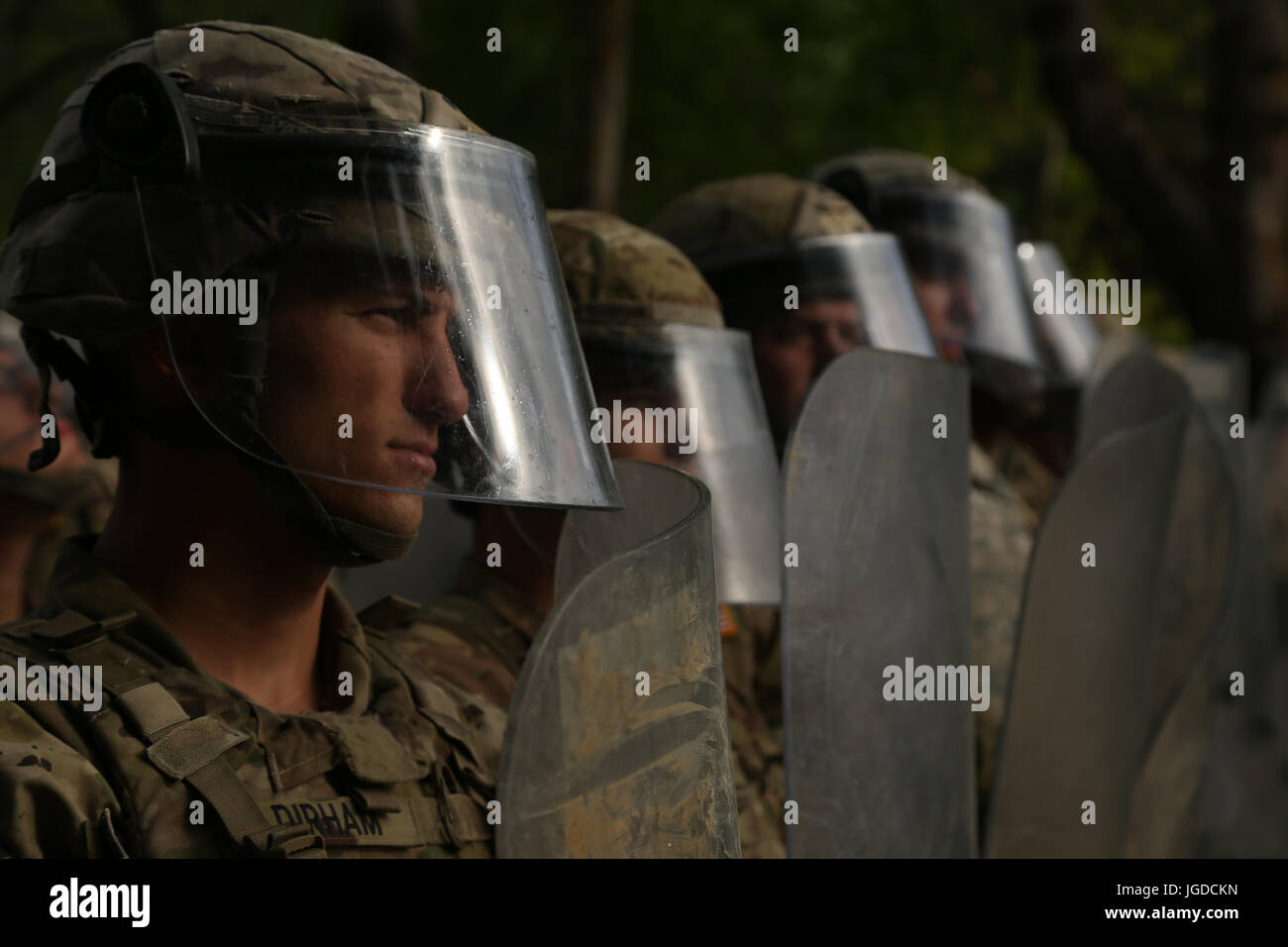 U.S. Soldiers of the 82nd Airborne Brigade form a crowd control ...