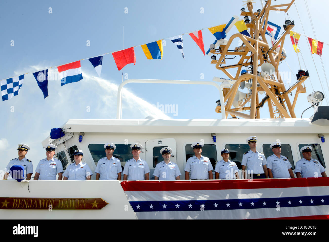 The crew of Coast Guard Cutter Benjamin Dailey mans the rail during the ...
