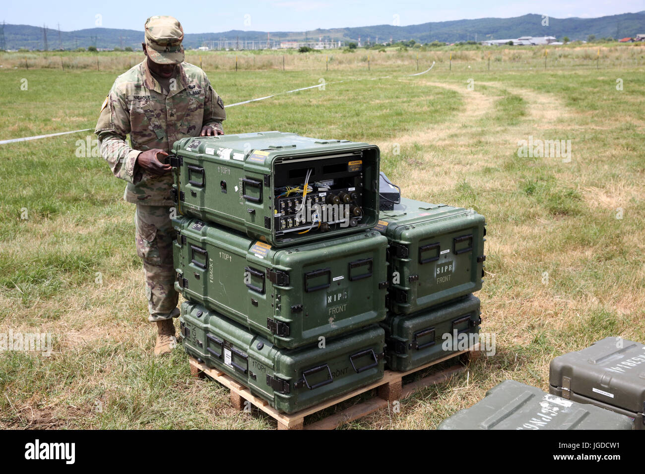 U.S. Army Sgt. Harrison Nichols, a Command Post Node team chief ...