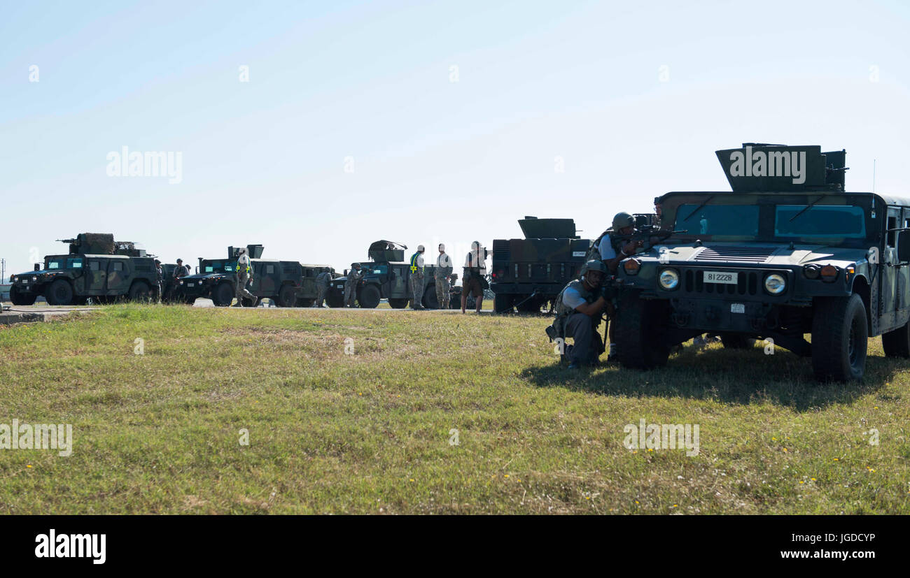 U.S. Airmen assigned to the 39th Security Forces Squadron (SFS), form a ...