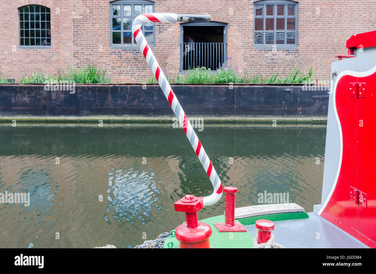 Colourful narrowboat on the canal running through Birmingham at ...