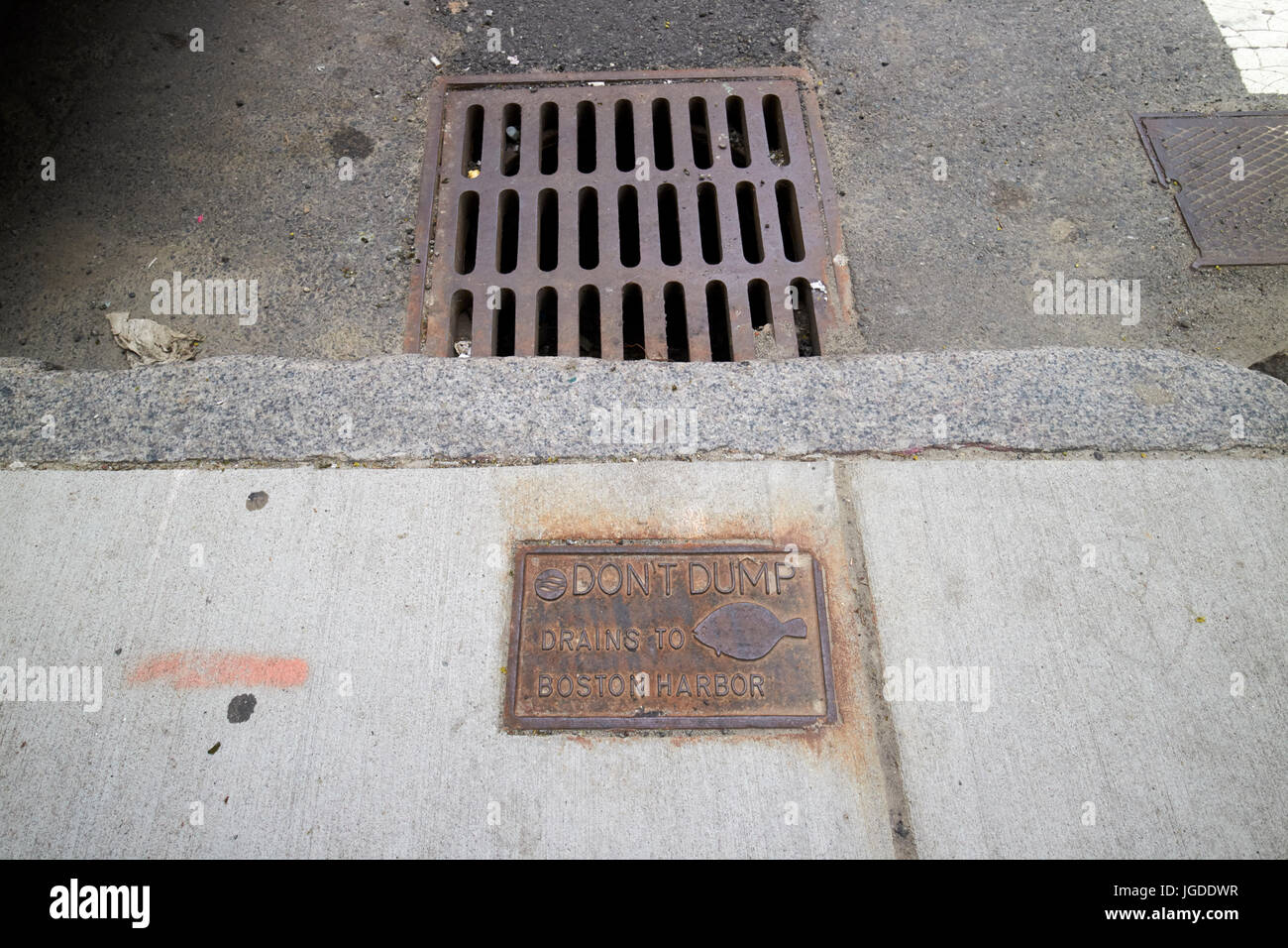dont dump drains to boston harbor sign next to street level storm water ...