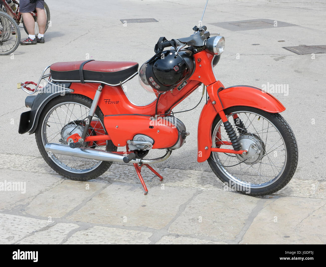 red florett scooter with helmet Stock Photo - Alamy