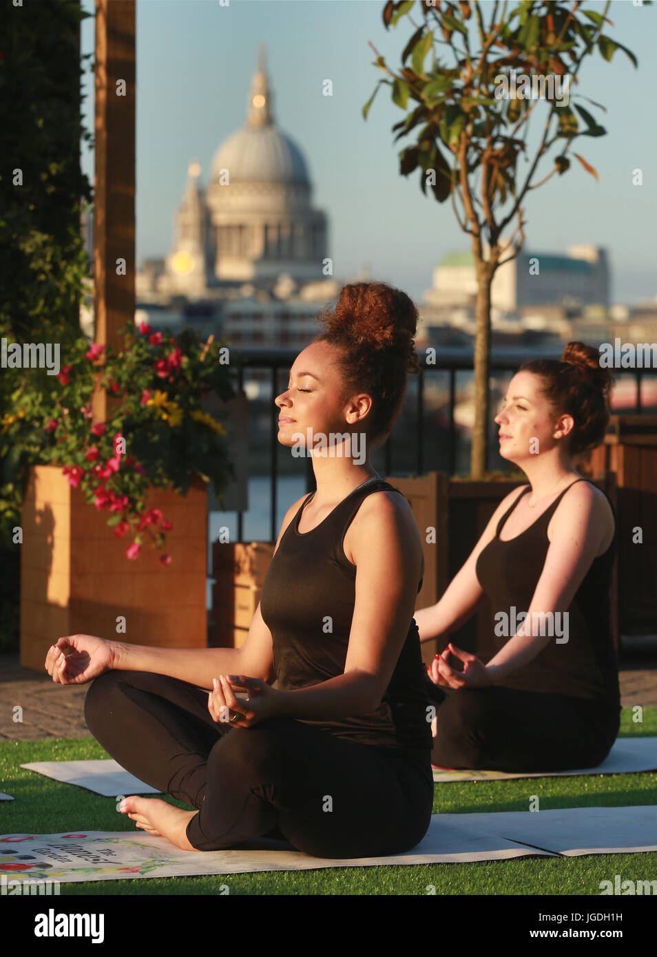 EDITORIAL USE ONLY Emma Cagill (left) from London and Julia Riddle from ...