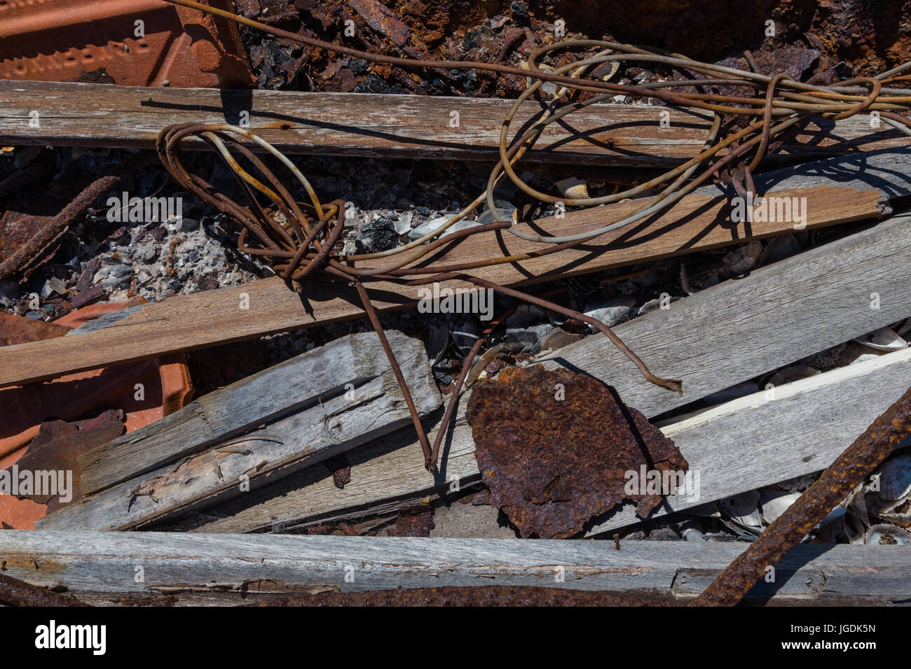 garbage with metal, wood, shells on bonfire site Stock Photo - Alamy