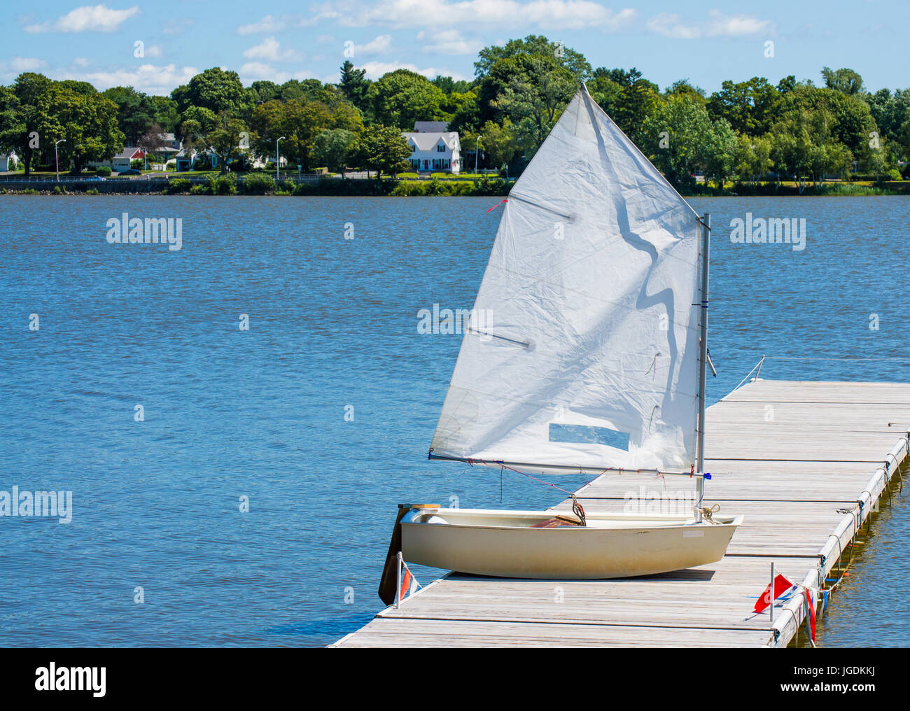 small sailboat sitting on dock Stock Photo - Alamy