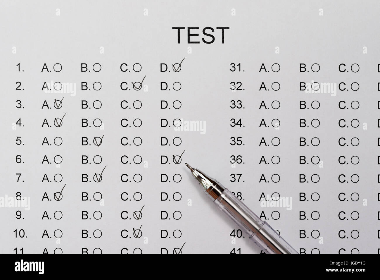 test score sheet with answers and ballpoint close up Stock Photo - Alamy