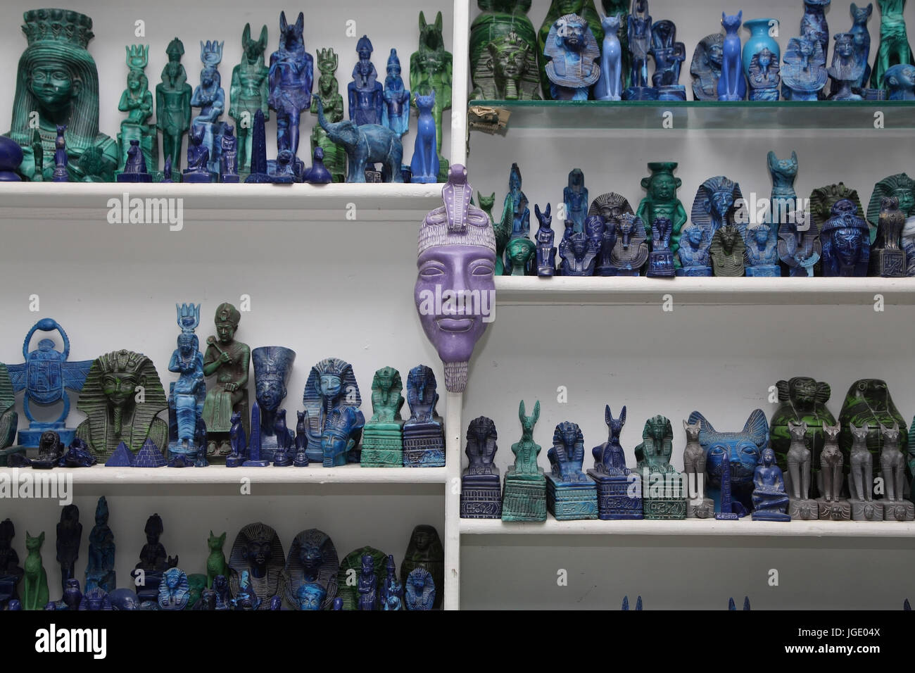 Stone figures in a store, Steinfiguren in einem Laden Stock Photo - Alamy
