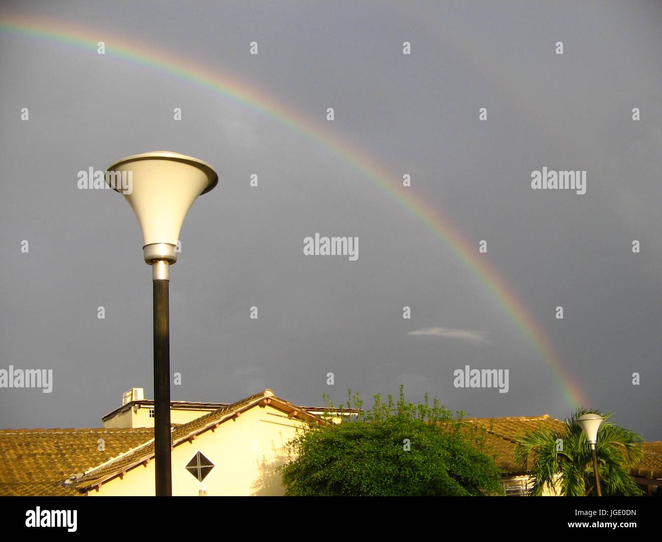 Street light and rainbow background Stock Photo - Alamy