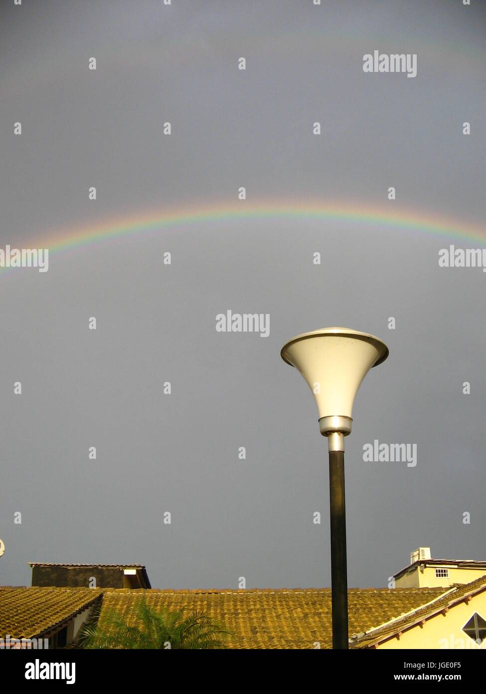 Street light and rainbow background Stock Photo - Alamy