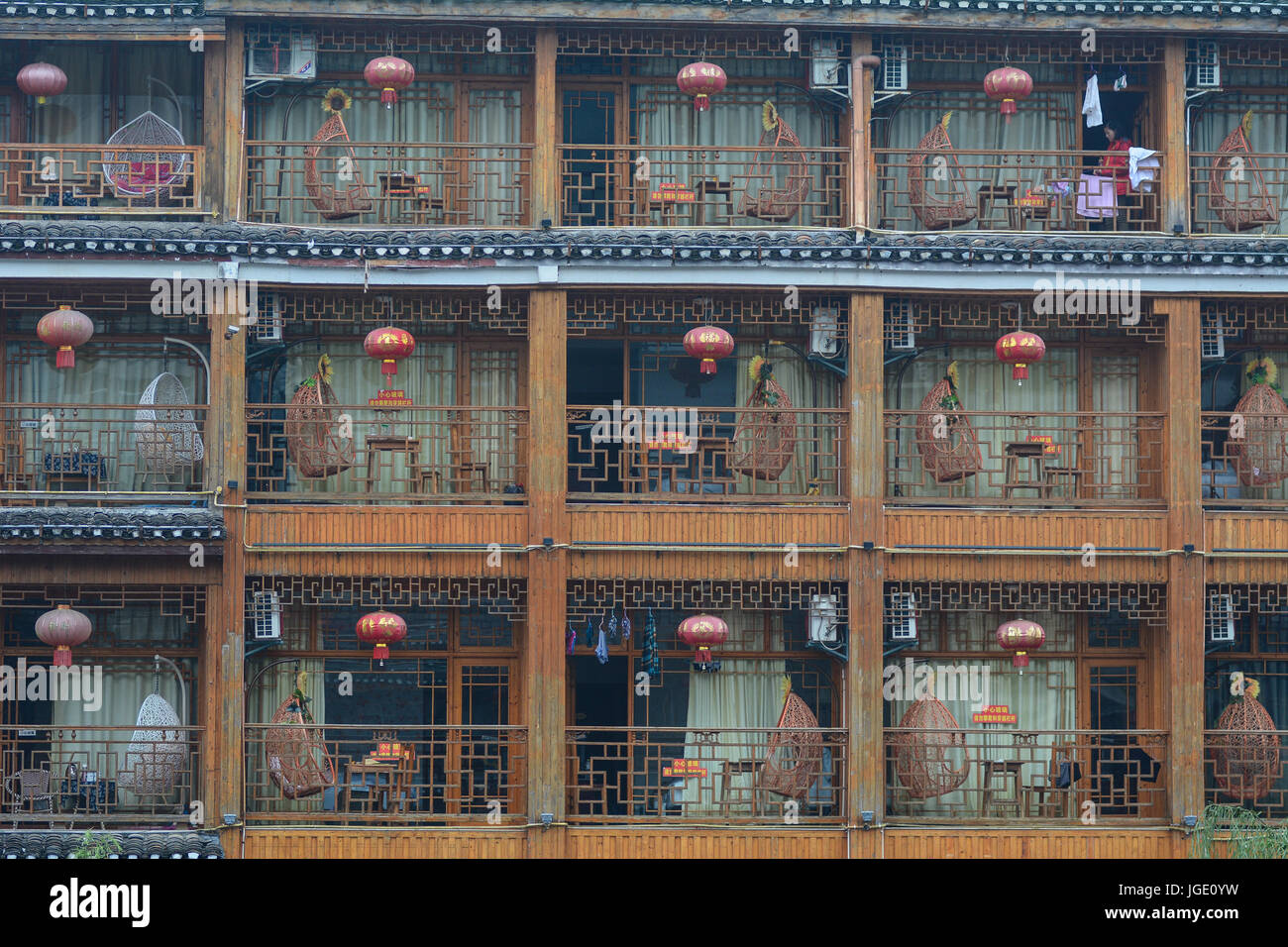Hunan, China - Nov 6, 2015. Facade of wooden hotel at Fenghuang Ancient ...