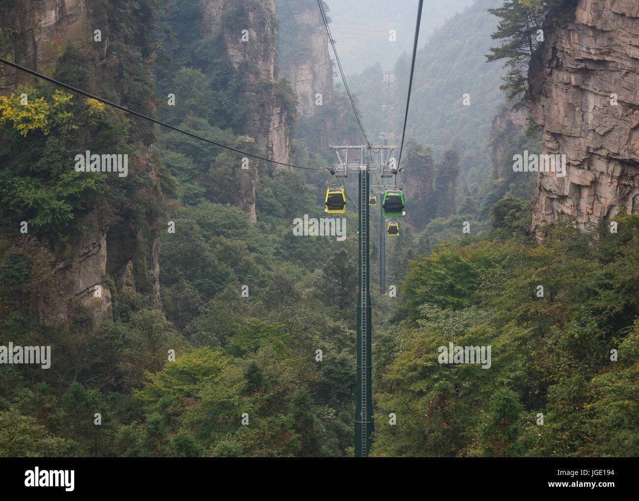 Cable cars at Zhangjiajie National Park in Hunan, China. Zhangjiajie is ...