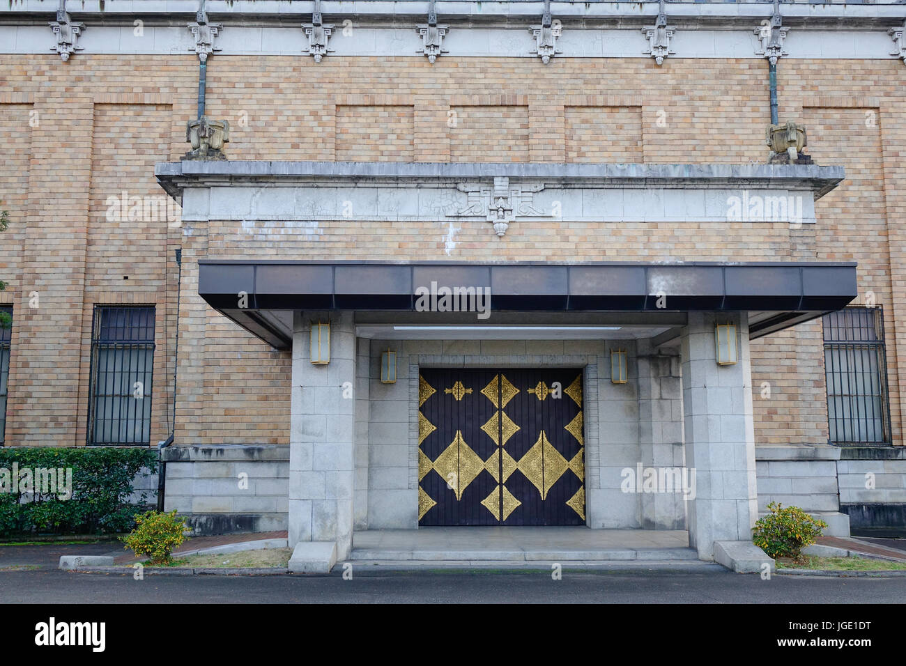 Facade of new brick building with wooden door in Kyoto, Japan Stock ...