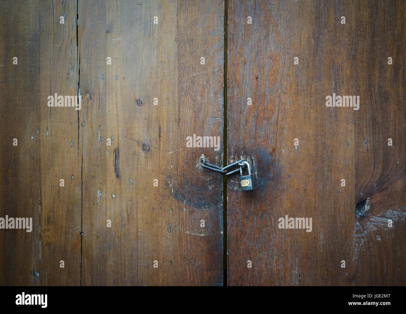 Old wooden door with the lock at the ancient house Stock Photo - Alamy
