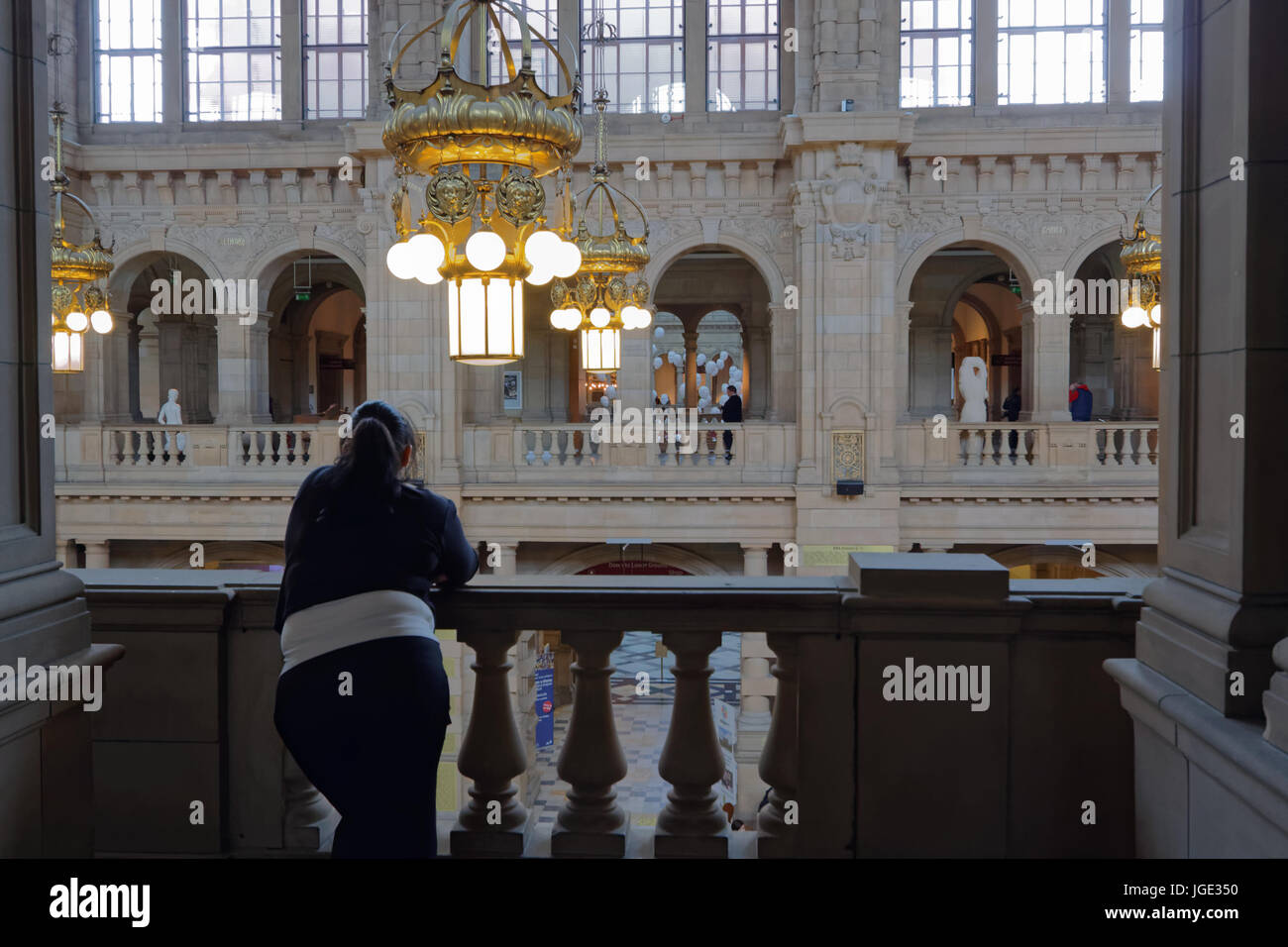 single larger woman girl alone contemplating life looking over balcony ...