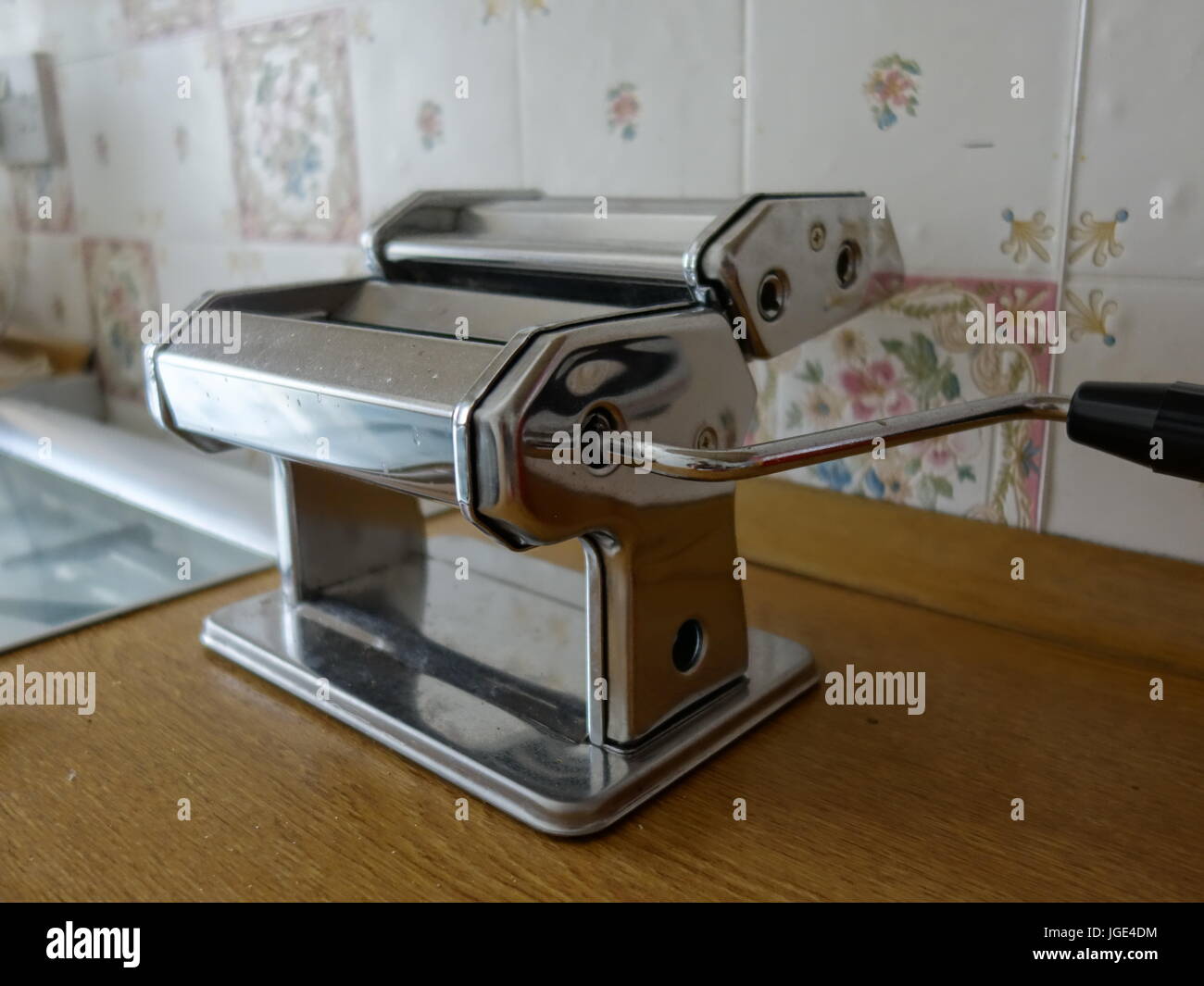 A pasta maker on a counter Stock Photo - Alamy
