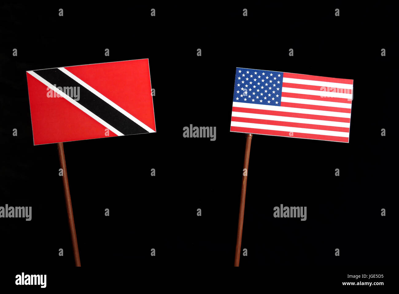 Trinidad and Tobago flag with USA flag isolated on black background ...