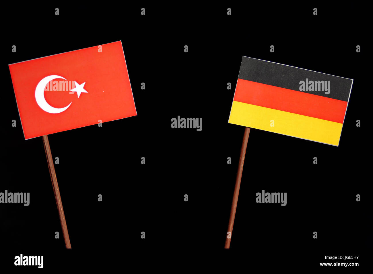Turkish flag with German flag isolated on black background Stock Photo ...