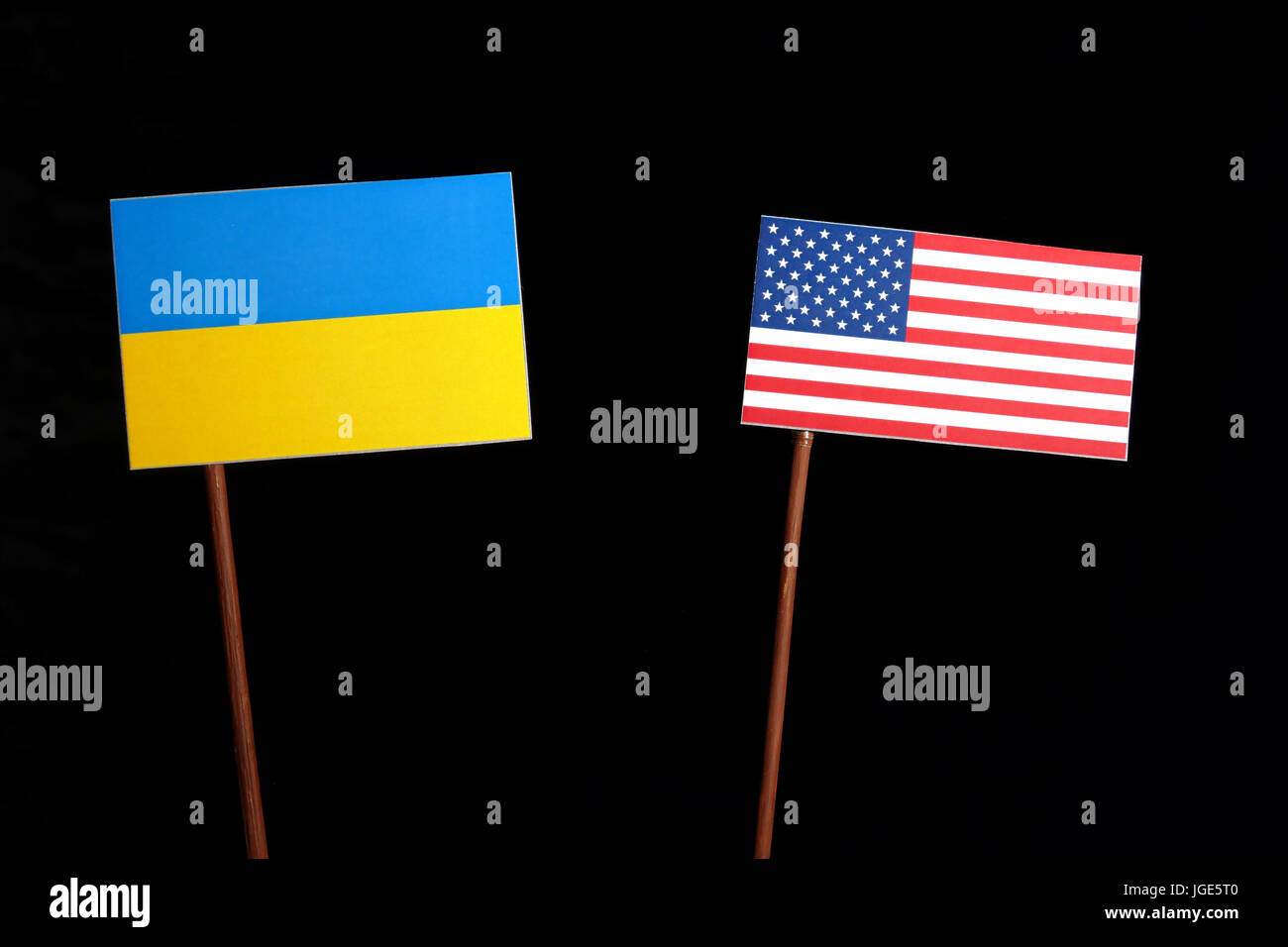Ukraine flag with USA flag isolated on black background Stock Photo - Alamy
