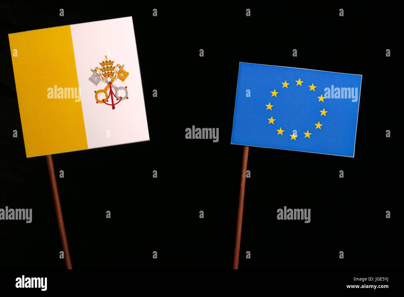 Vatican flag with European Union (EU) flag isolated on black background ...