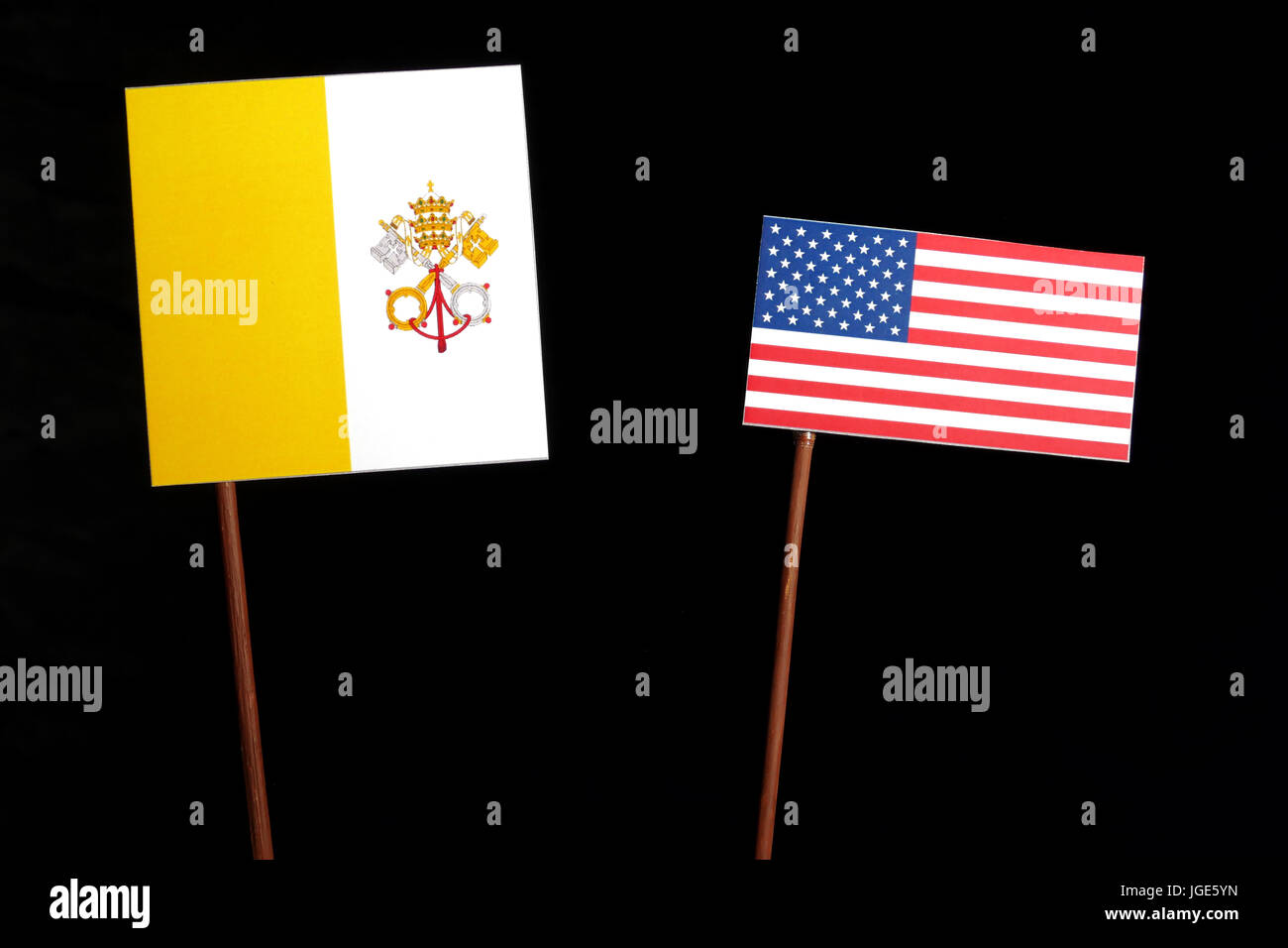 Vatican flag with USA flag isolated on black background Stock Photo - Alamy