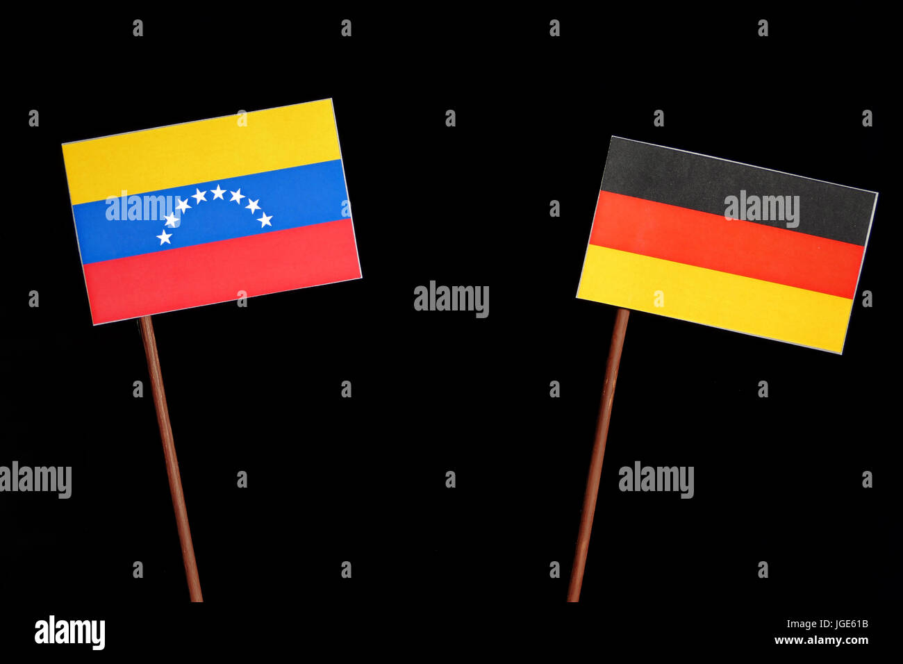 Venezuelan flag with German flag isolated on black background Stock ...
