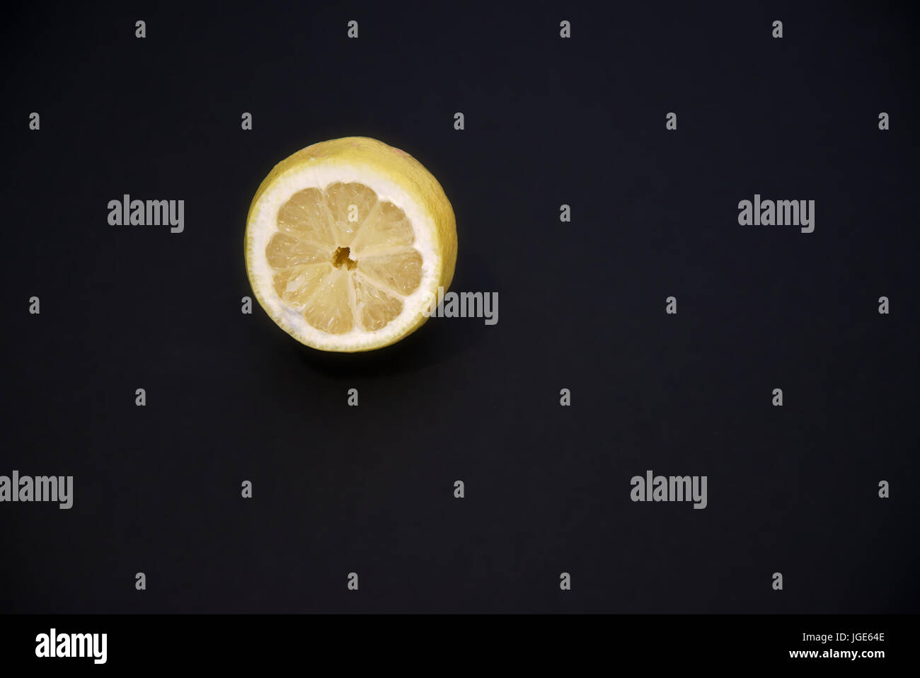 Lemon Stock Photography. Lemon with a dark background Stock Photo - Alamy