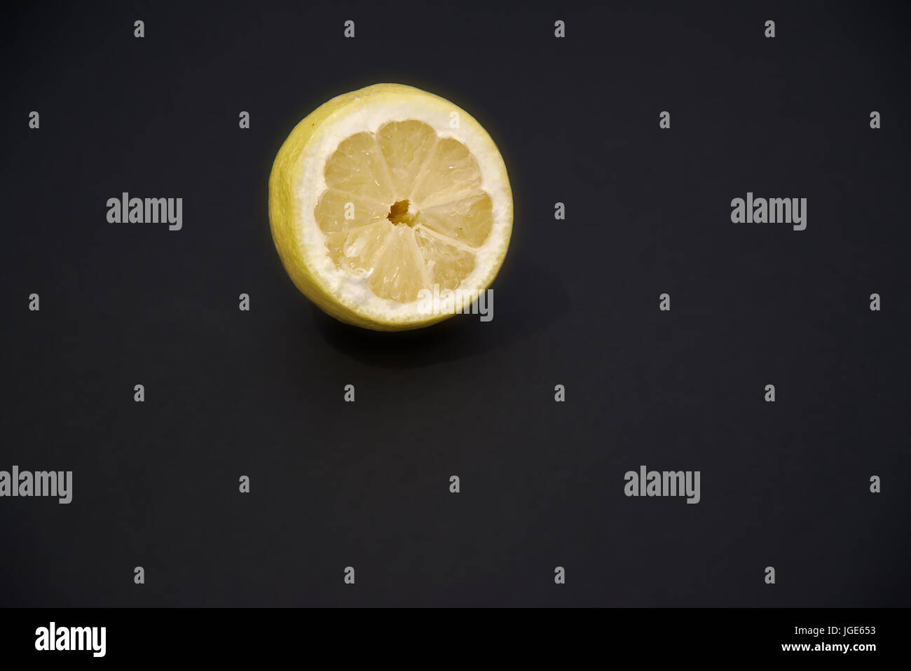 Lemon Stock Photography. Lemon with a dark background Stock Photo - Alamy