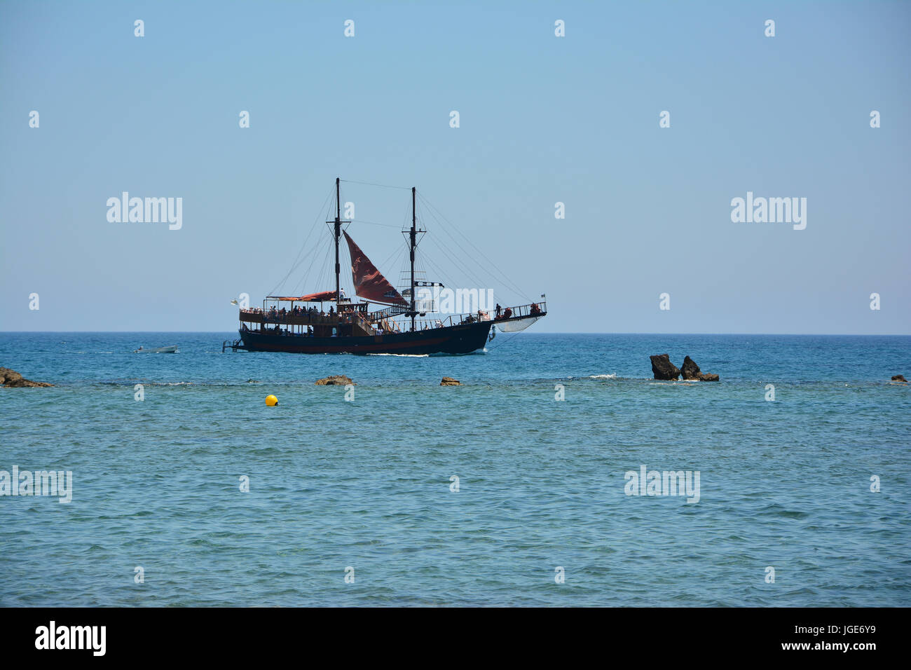 pirate ship the jolly roger cruises along the west coast of Cyprus into ...