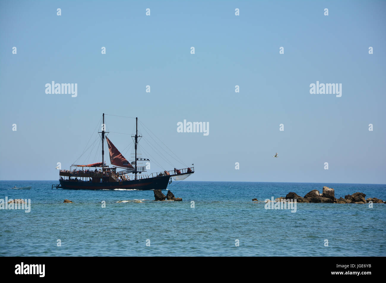 pirate ship the jolly roger cruises along the west coast of Cyprus into ...