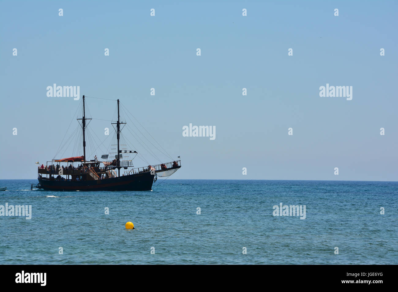 pirate ship the jolly roger cruises along the west coast of Cyprus into ...