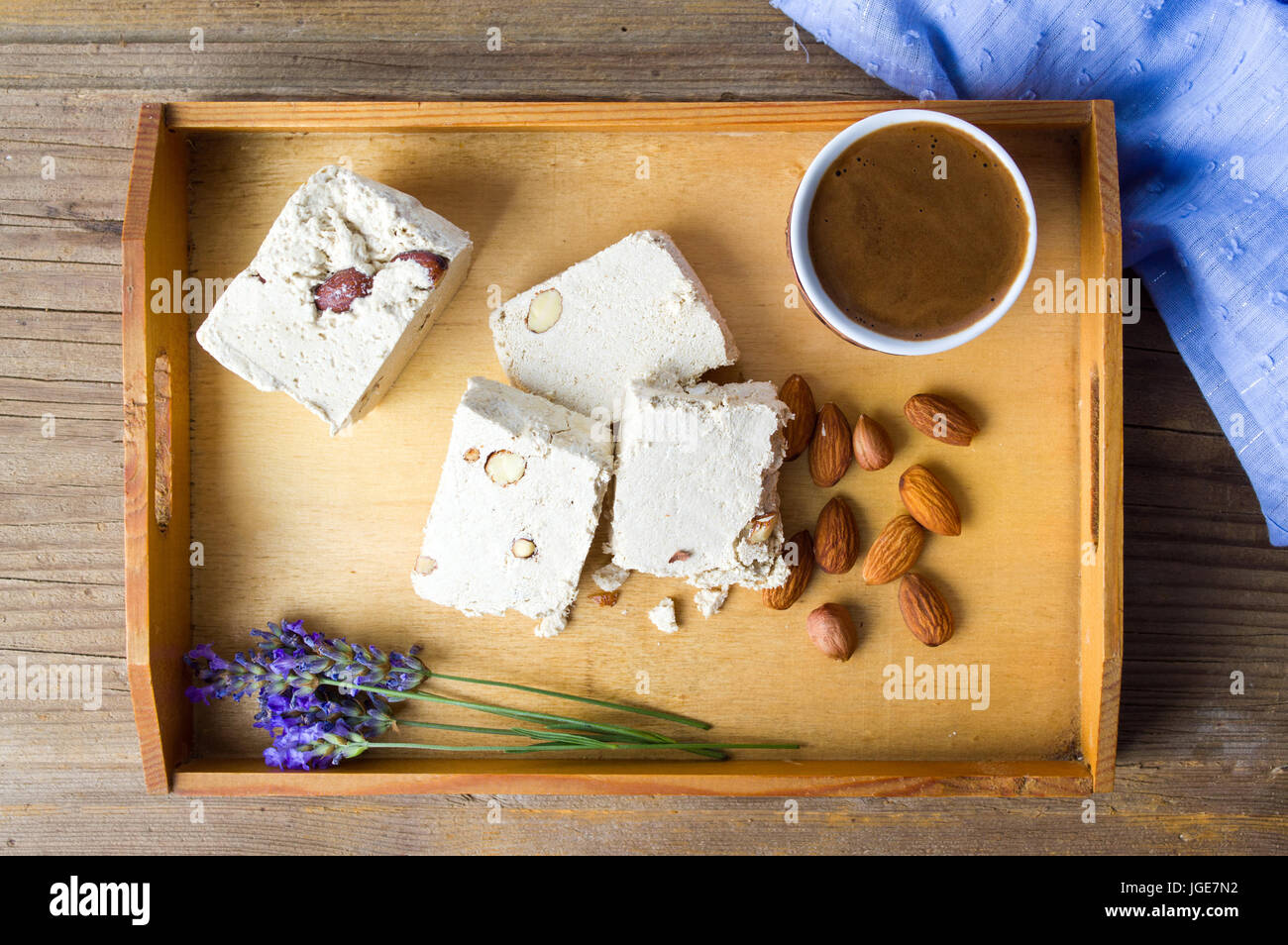 Halva dessert and black coffee on a tray Stock Photo - Alamy