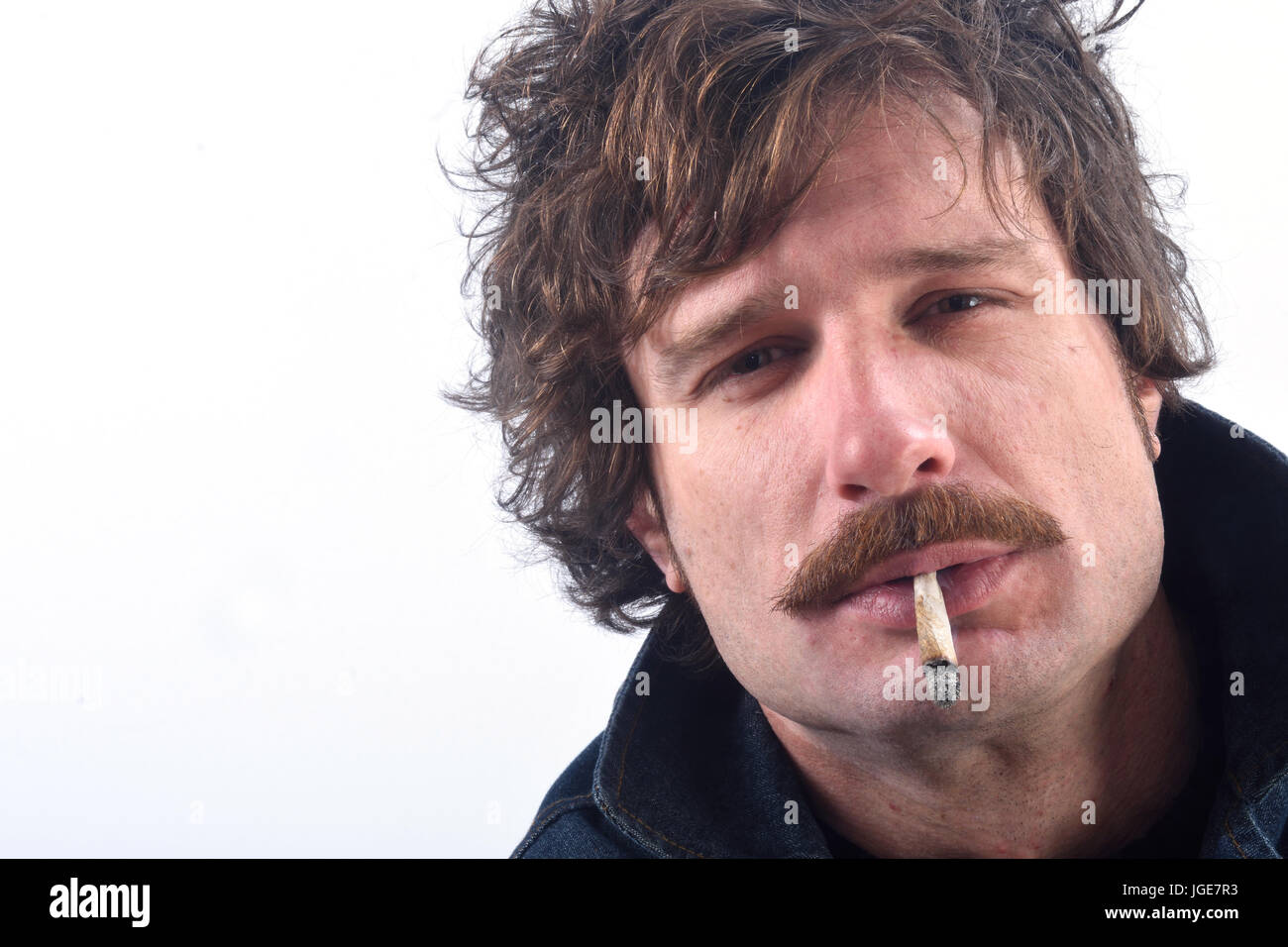 Portrait of a man smoking liar tobacco on white background Stock Photo ...