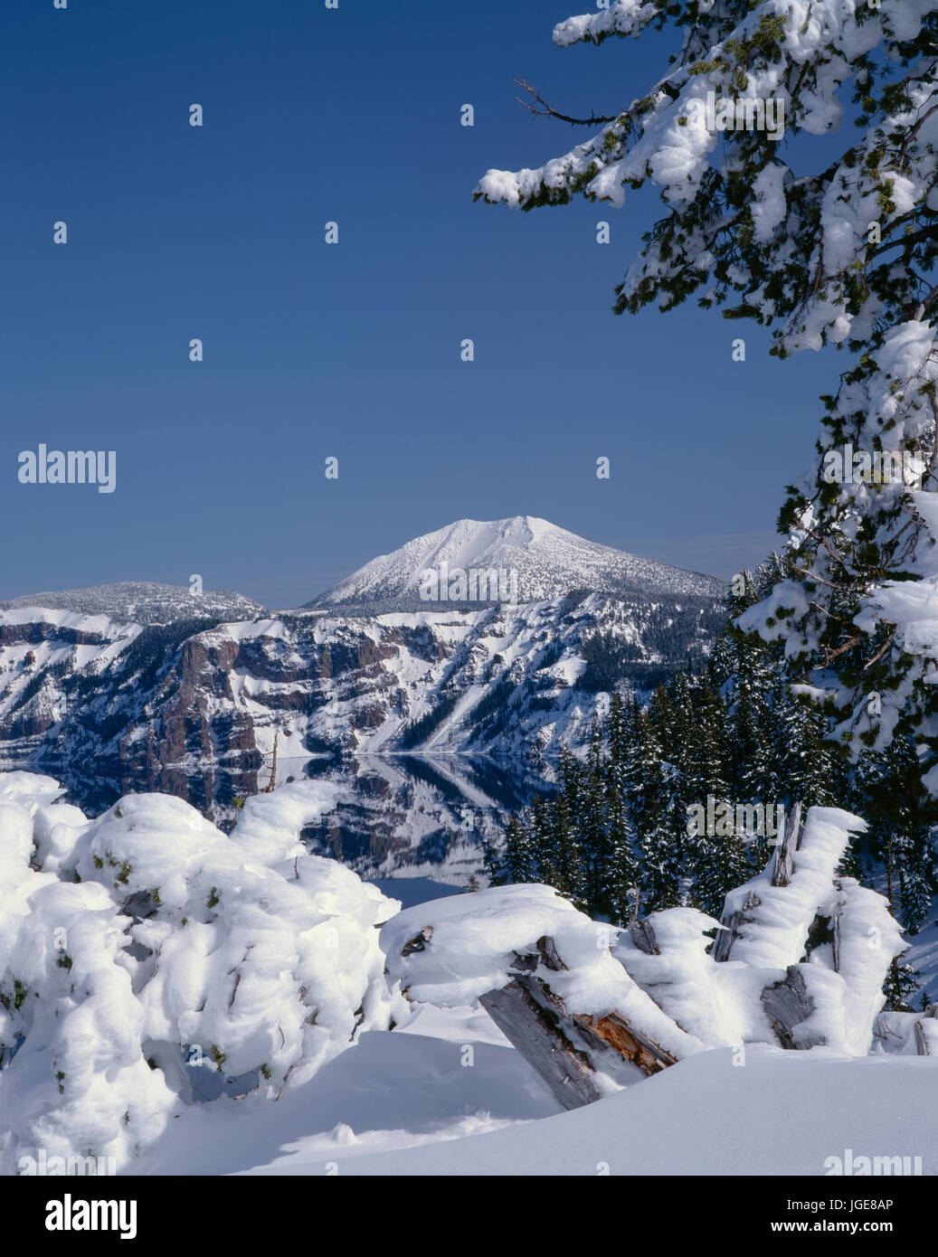 USA, Oregon, Crater Lake National Park, Winter snow accumulates at ...