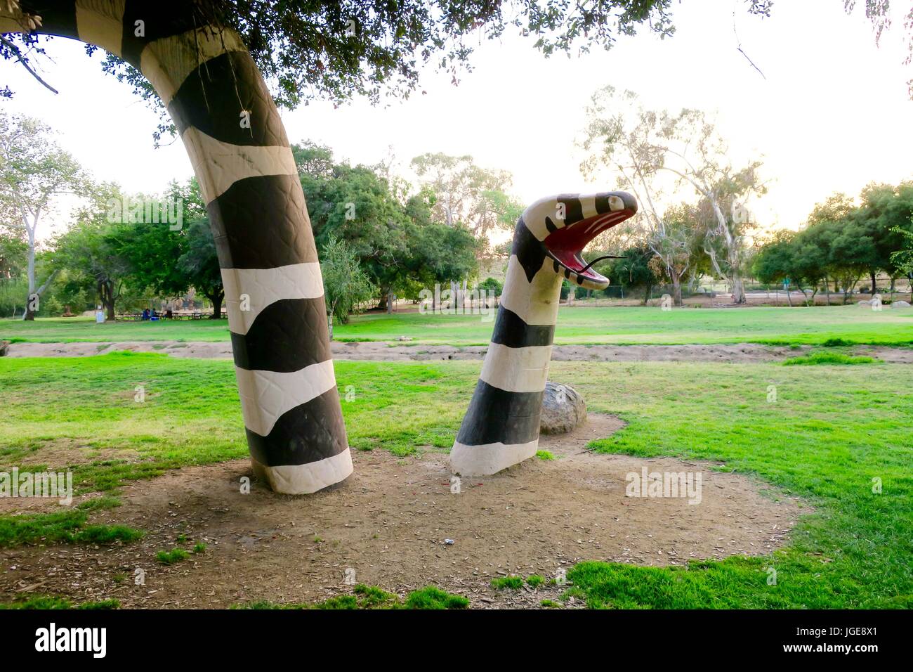 Large black and white striped free-form concrete snake at Kit Carson ...