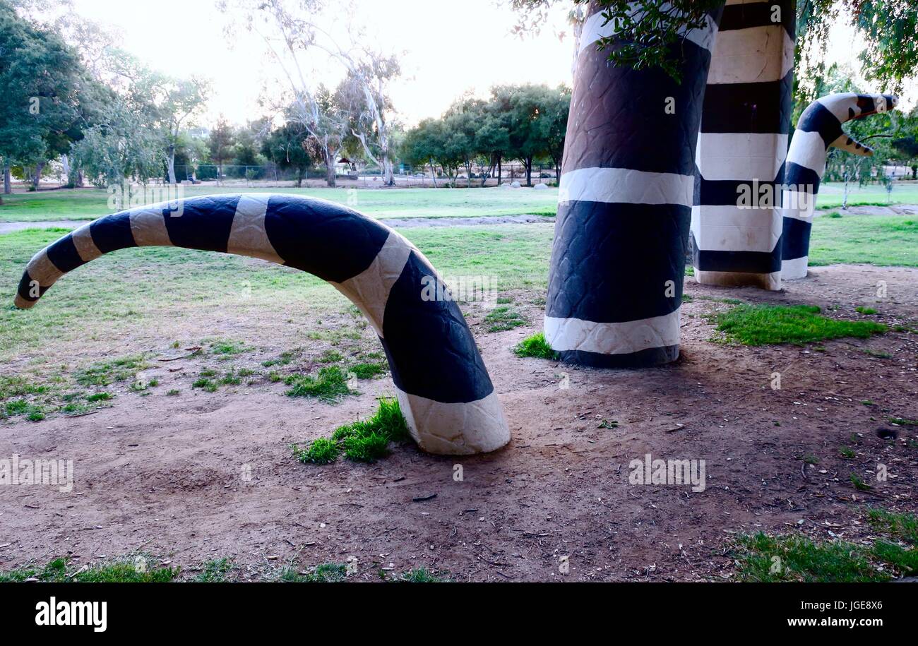 Large black and white striped free-form concrete snake at Kit Carson ...