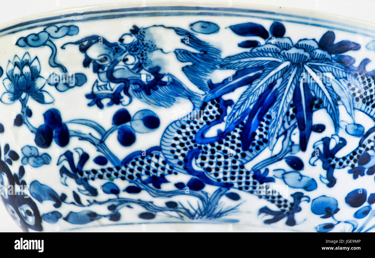 Closeup of antique 18th century Chinese porcelain four claw dragon ...