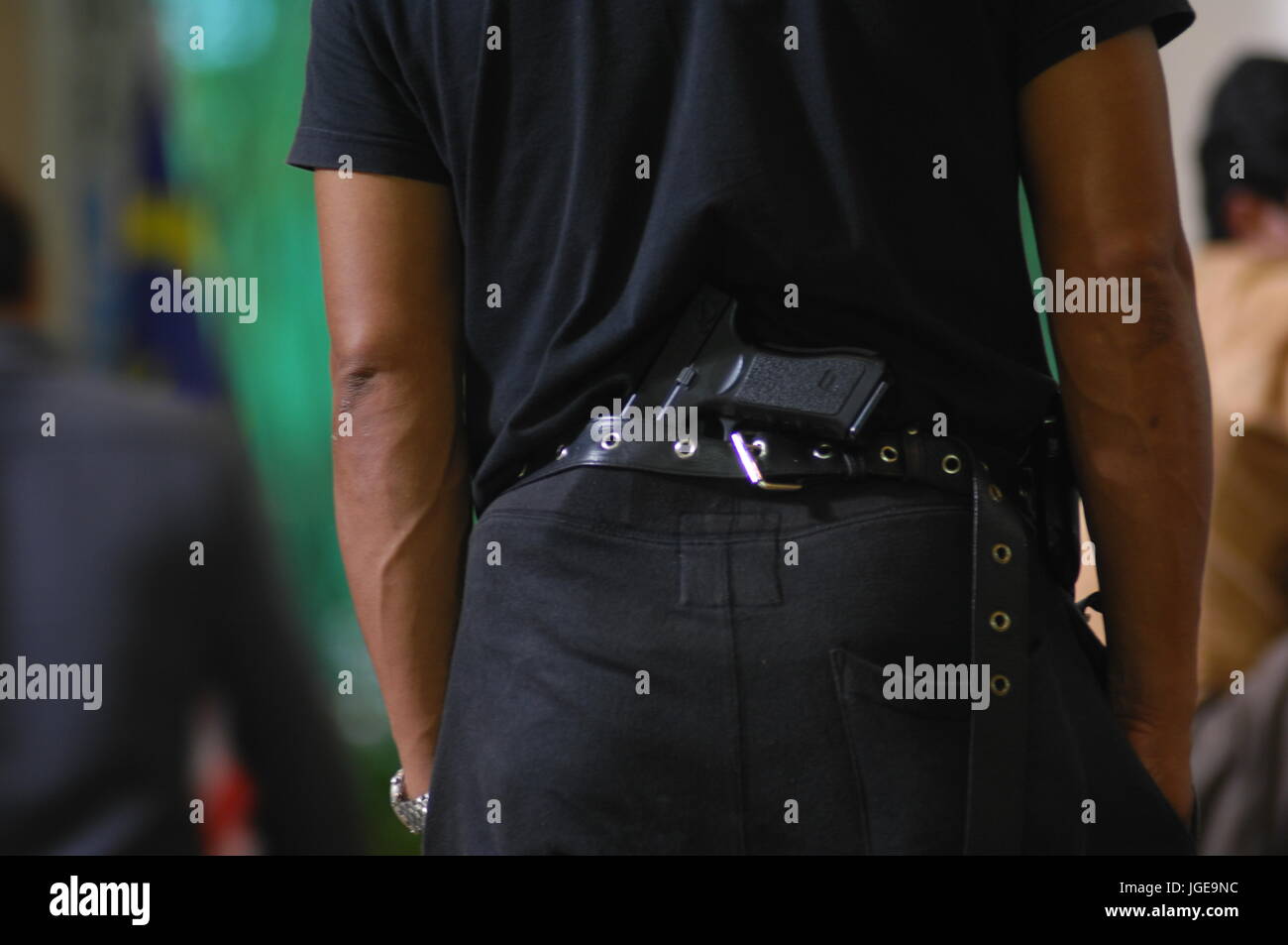 Male hand with revolver Stock Photo - Alamy