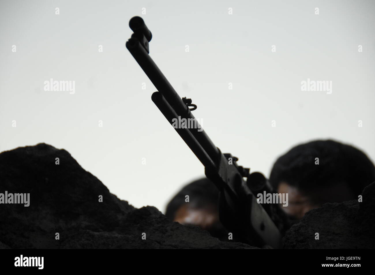 Male hand with revolver Stock Photo - Alamy