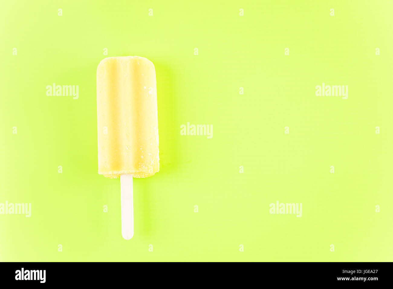 Multicolored fruit ice cream bars on colored background Stock Photo - Alamy