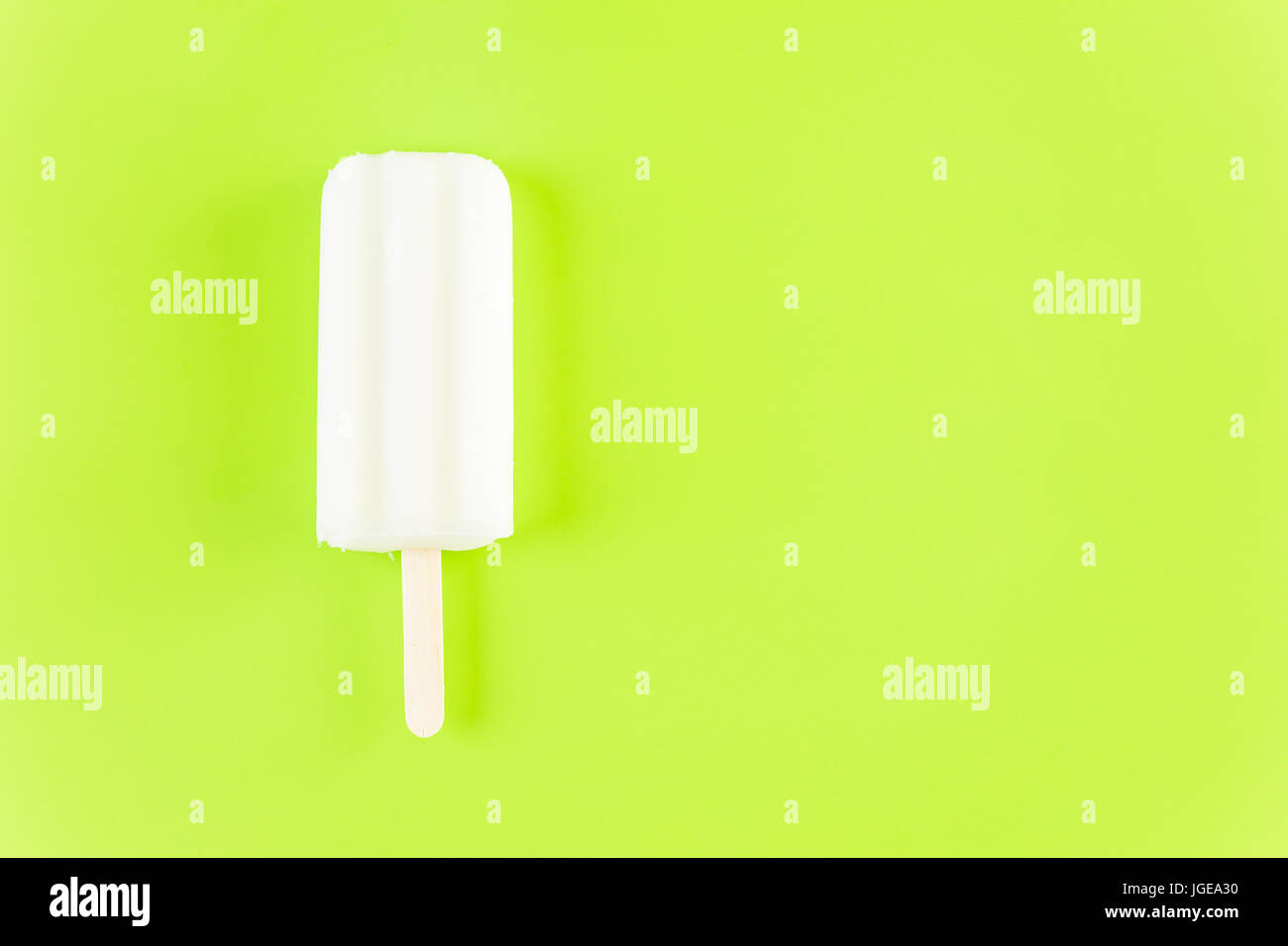 Multicolored fruit ice cream bars on colored background Stock Photo - Alamy