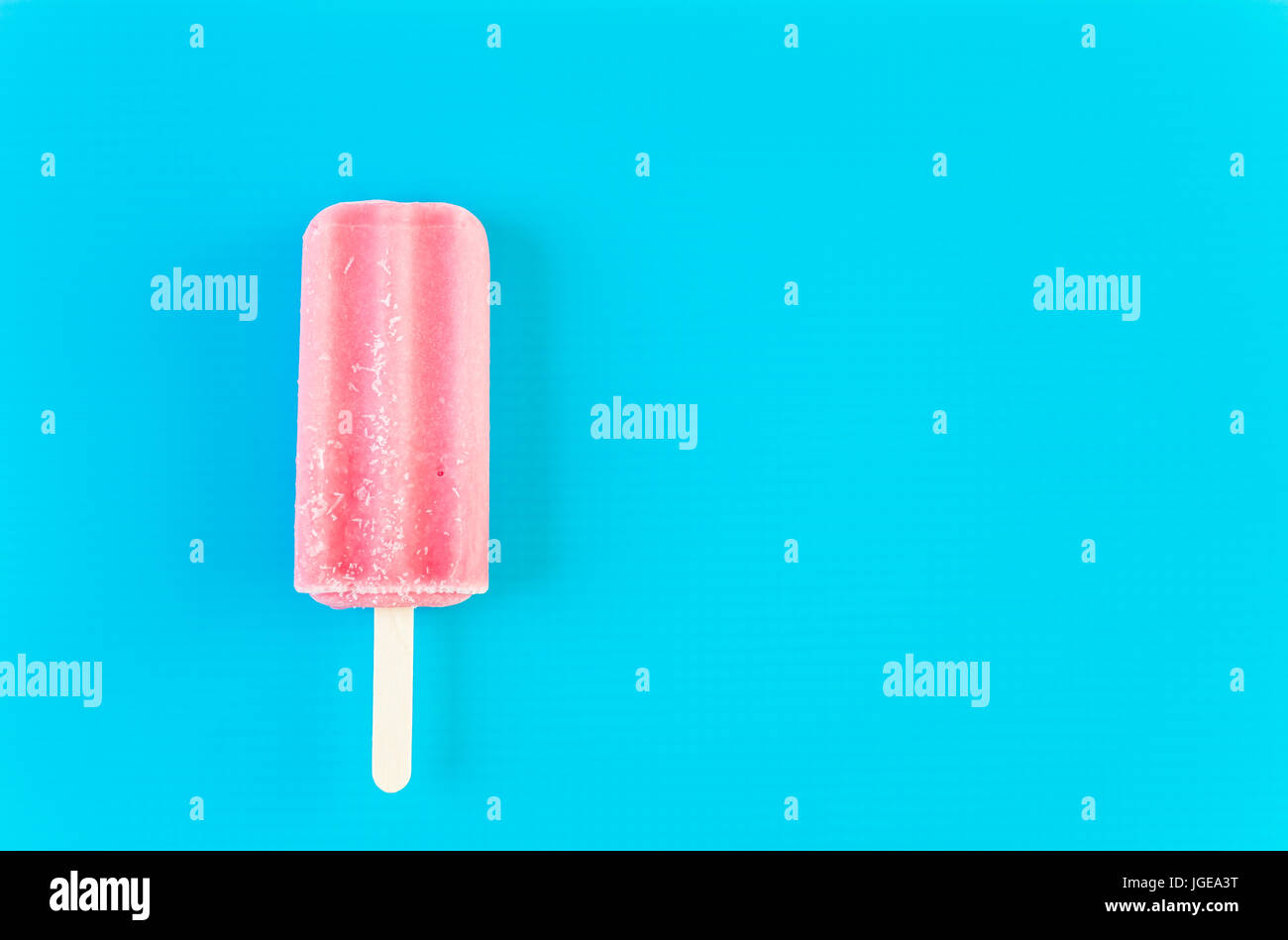 Multicolored fruit ice cream bars on colored background Stock Photo - Alamy