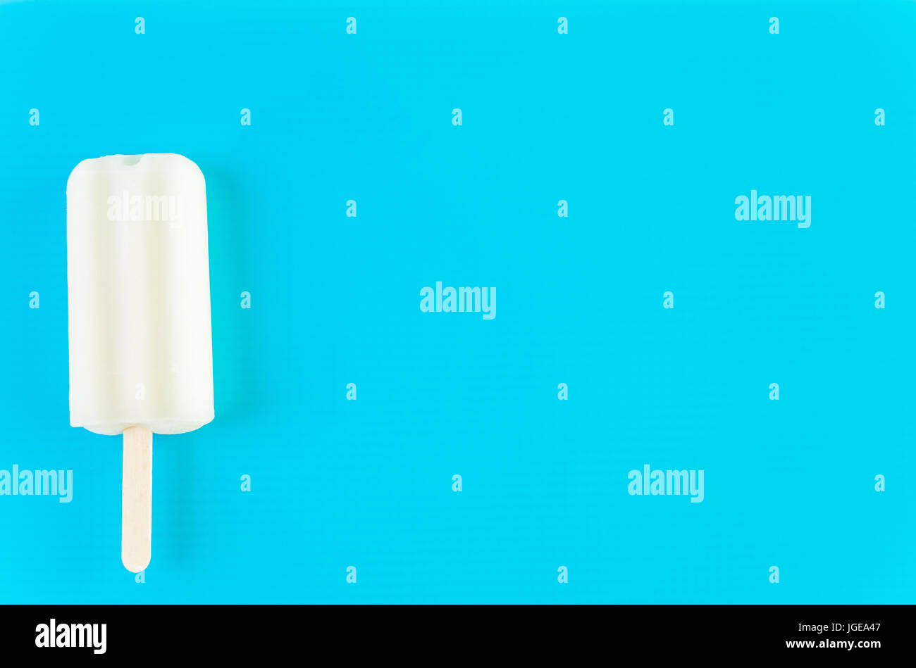 Multicolored fruit ice cream bars on colored background Stock Photo - Alamy